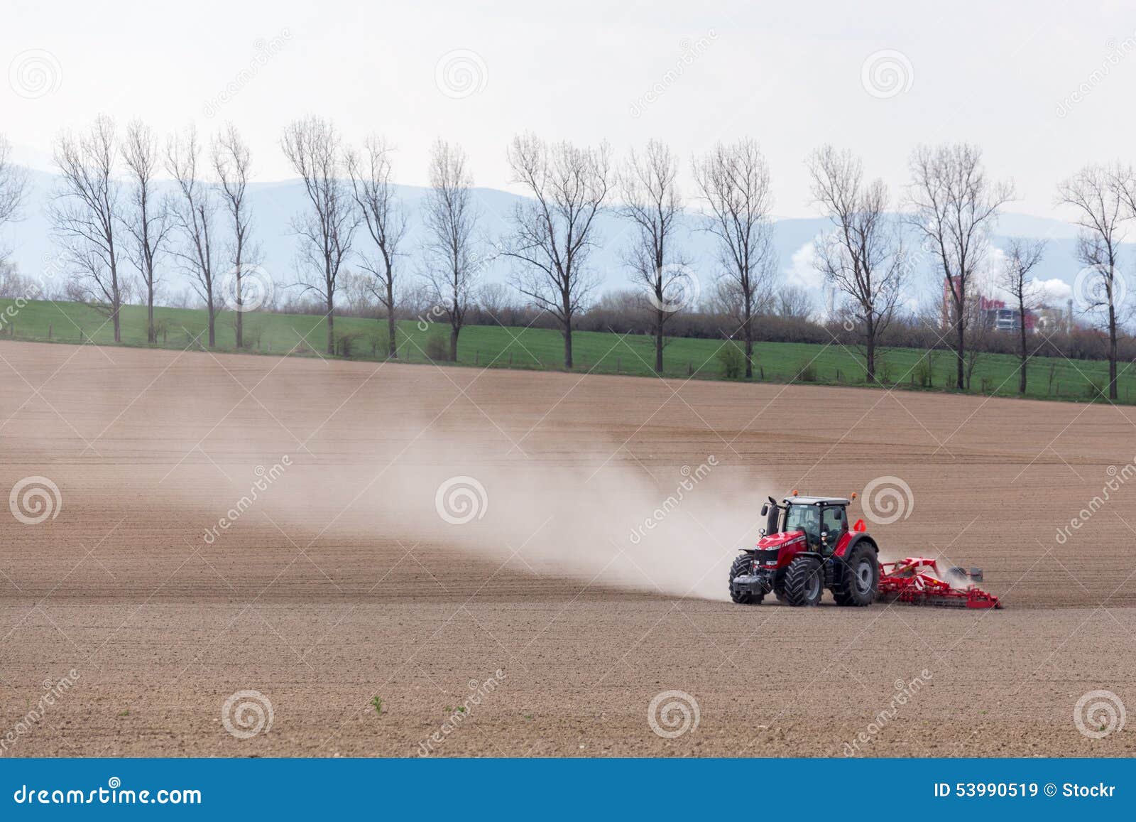 Tractor Harrowing the Field Stock Image - Image of farmer, landscape ...