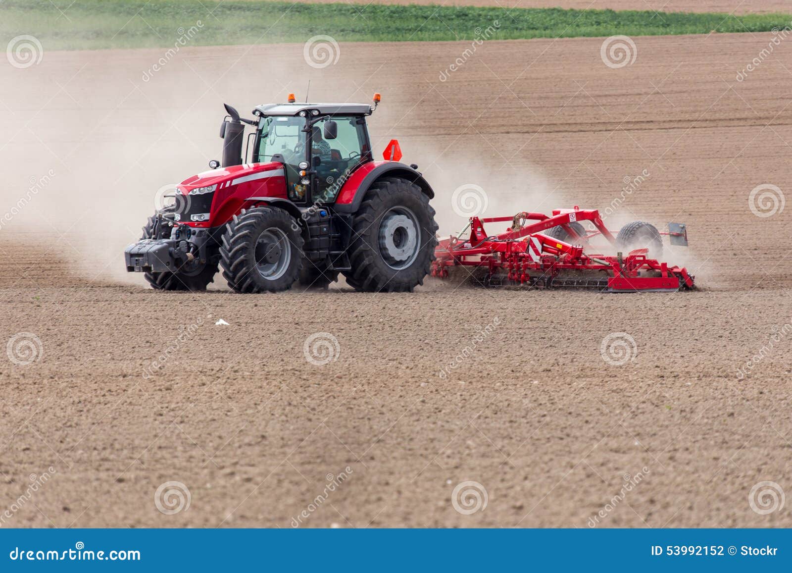 Tractor Harrowing the Field Stock Photo - Image of earth, growth: 53992152