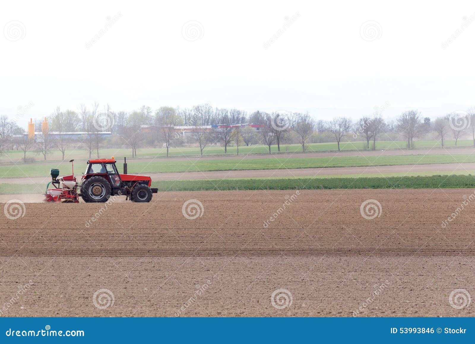 Tractor Harrowing the Field Stock Photo - Image of earth, growth: 53993846