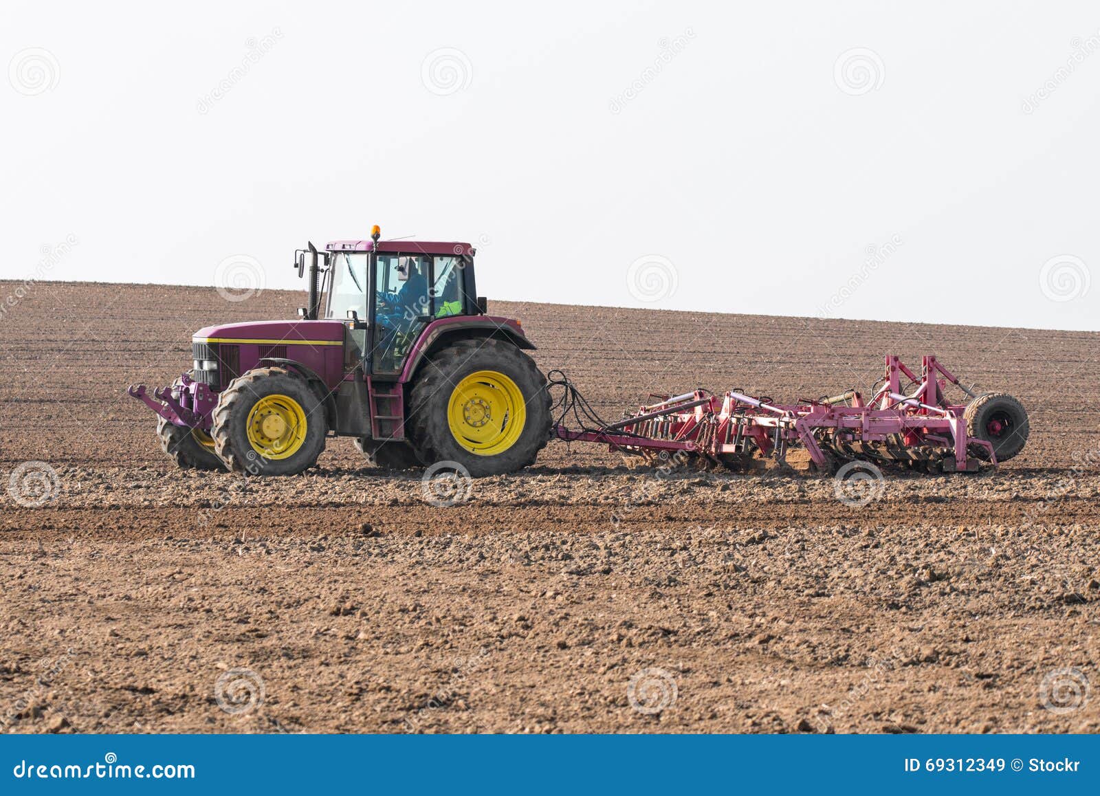 Tractor Harrowing the Field Stock Image - Image of cultivated, drive ...