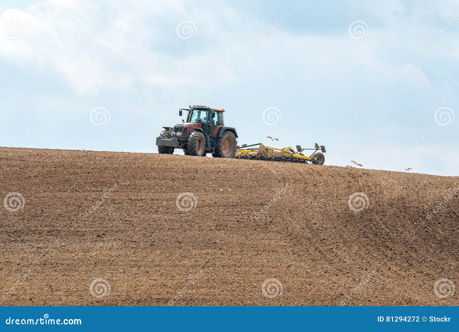 Tractor Harrowing the Field Stock Photo - Image of cultivating ...