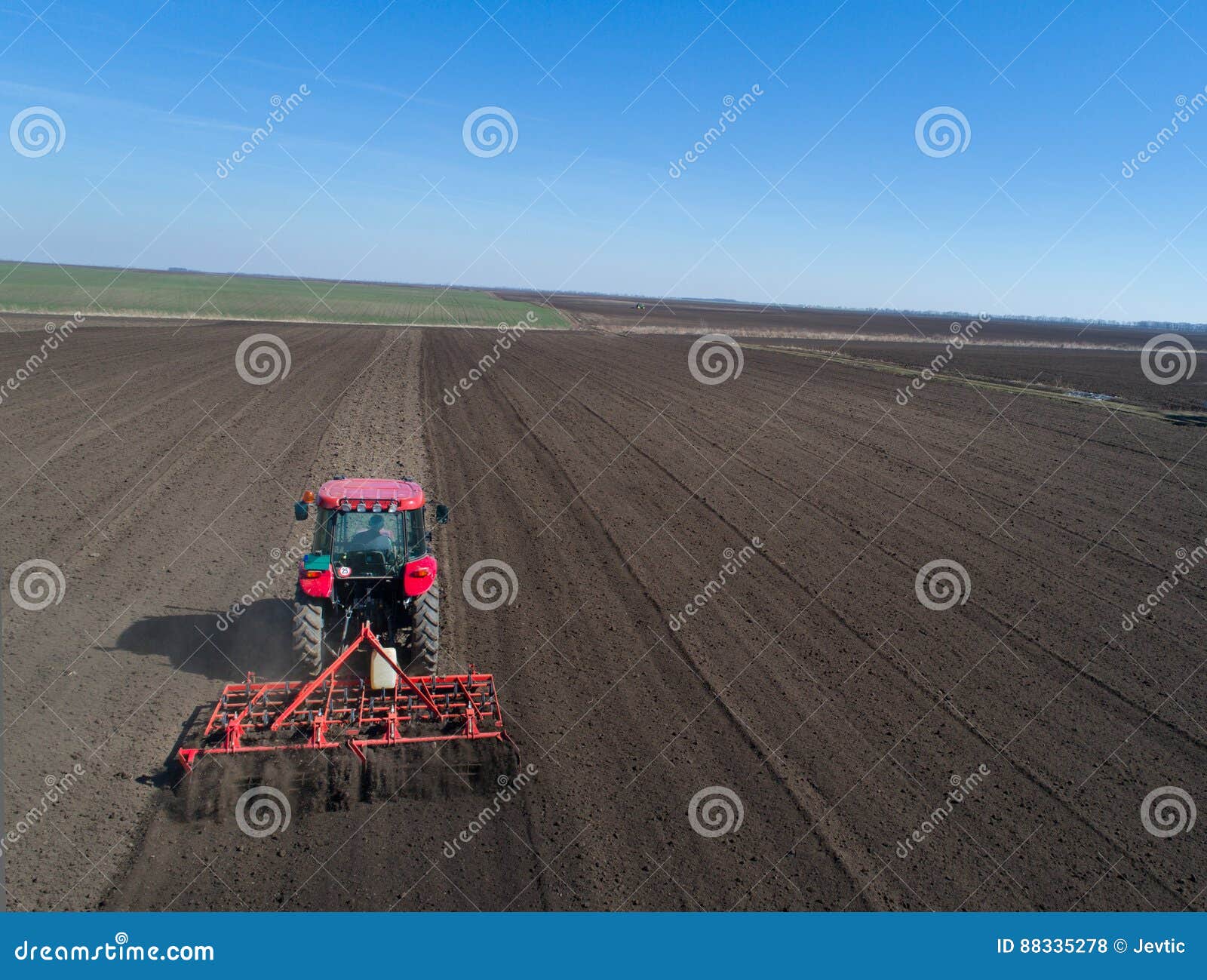 Tractor Harrowing Soil in Spring Stock Photo - Image of agronomy ...