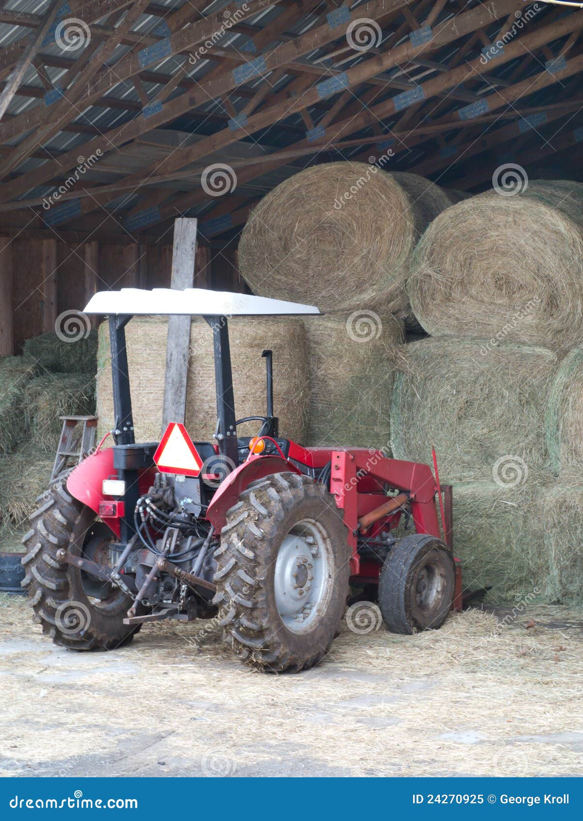 Tractor by the hay bails stock image. Image of countryside - 24270925