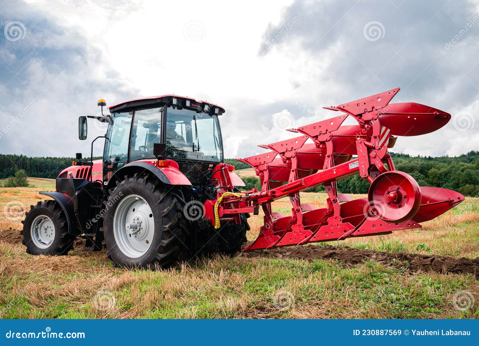 Tractor with a Large Plow is Ready To Work in the Field Stock Image ...