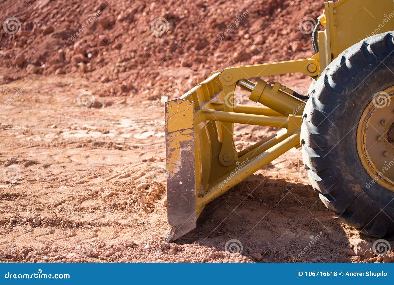 The Tractor is Leveling the Dirt Road Stock Photo - Image of building ...