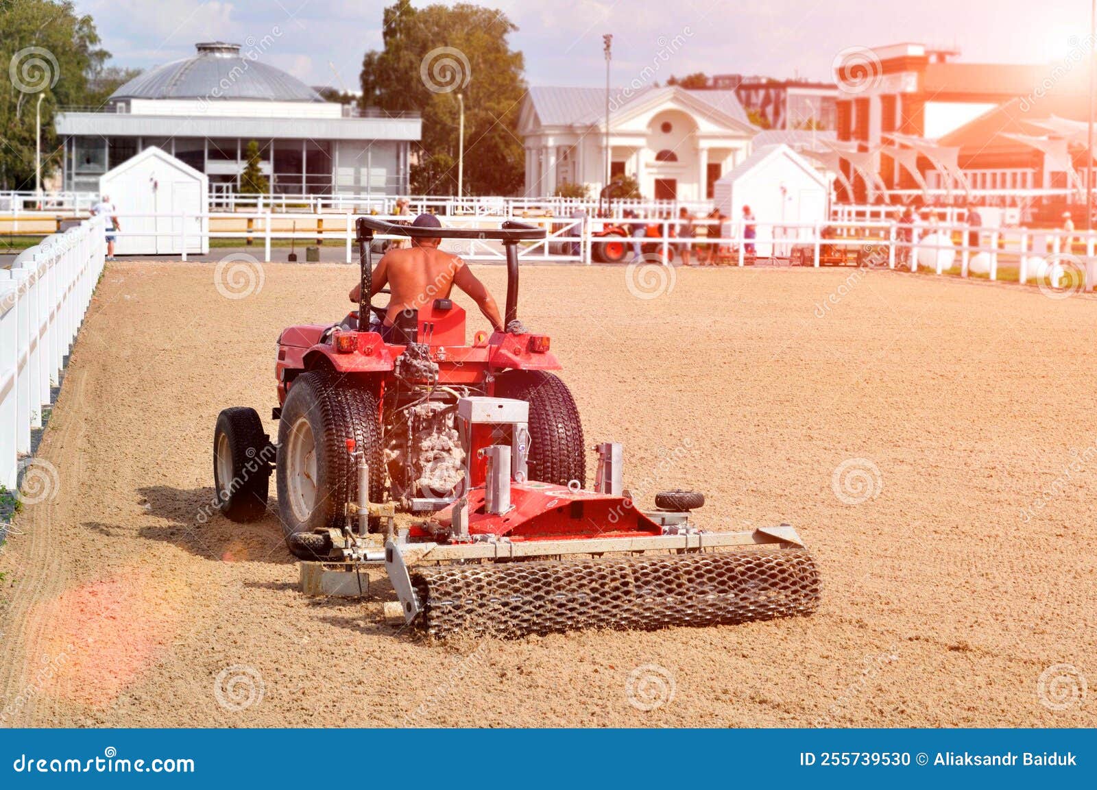 The Tractor is Leveling the Ground. Preparation of the Site for ...