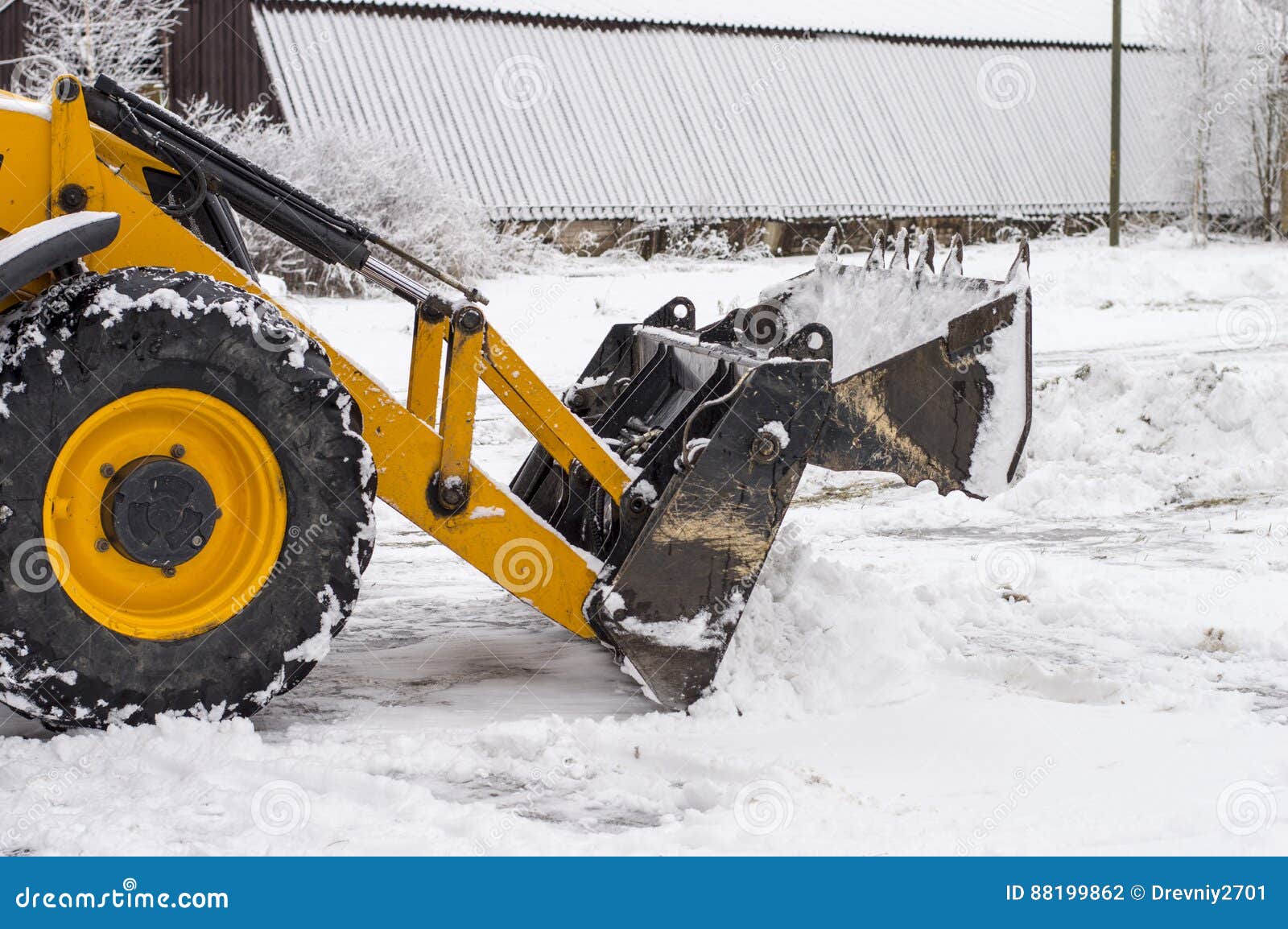 Tractor Loader Cleans Snow after a Snowfall Stock Photo - Image of ...