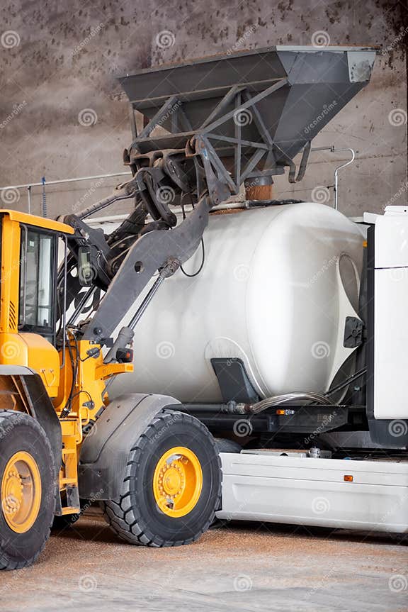 Tractor Loading Grain into Truck at at Grain Processing Plant Warehouse ...