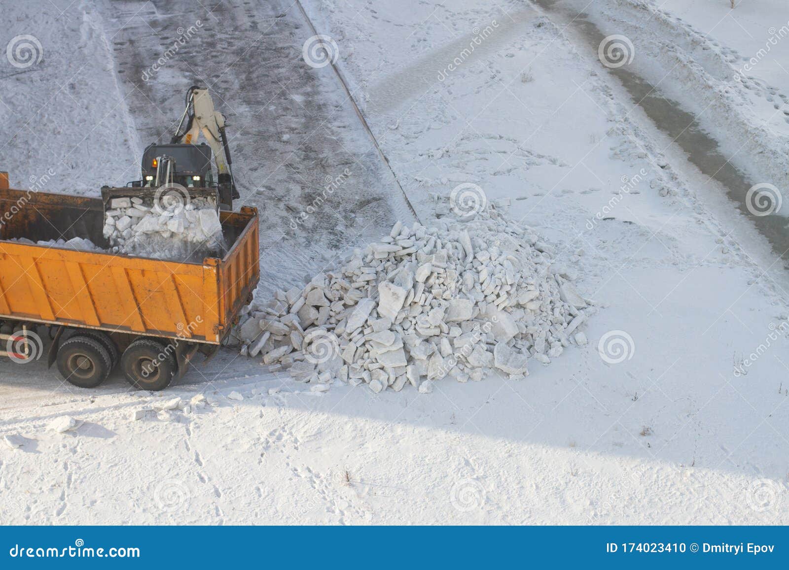 Tractor Loads the Clean Snow on the Dump Truck after Heavy Snowfall ...