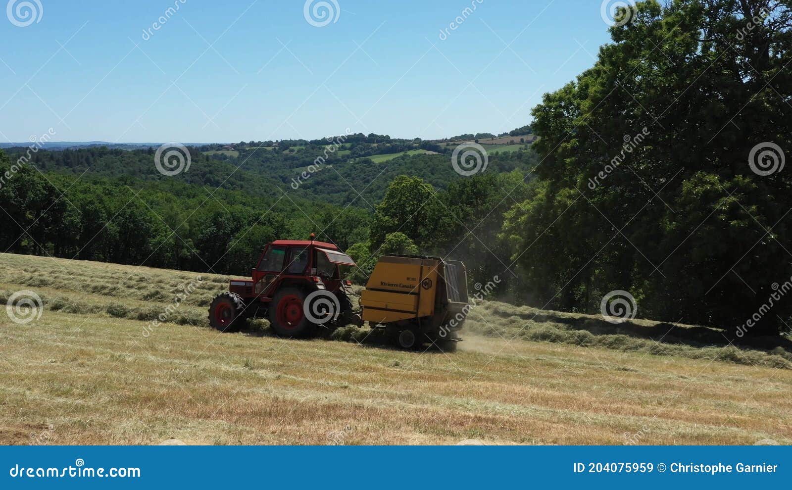 A Tractor Makes Hay Bales 2 Stock Video - Video of people, valley ...