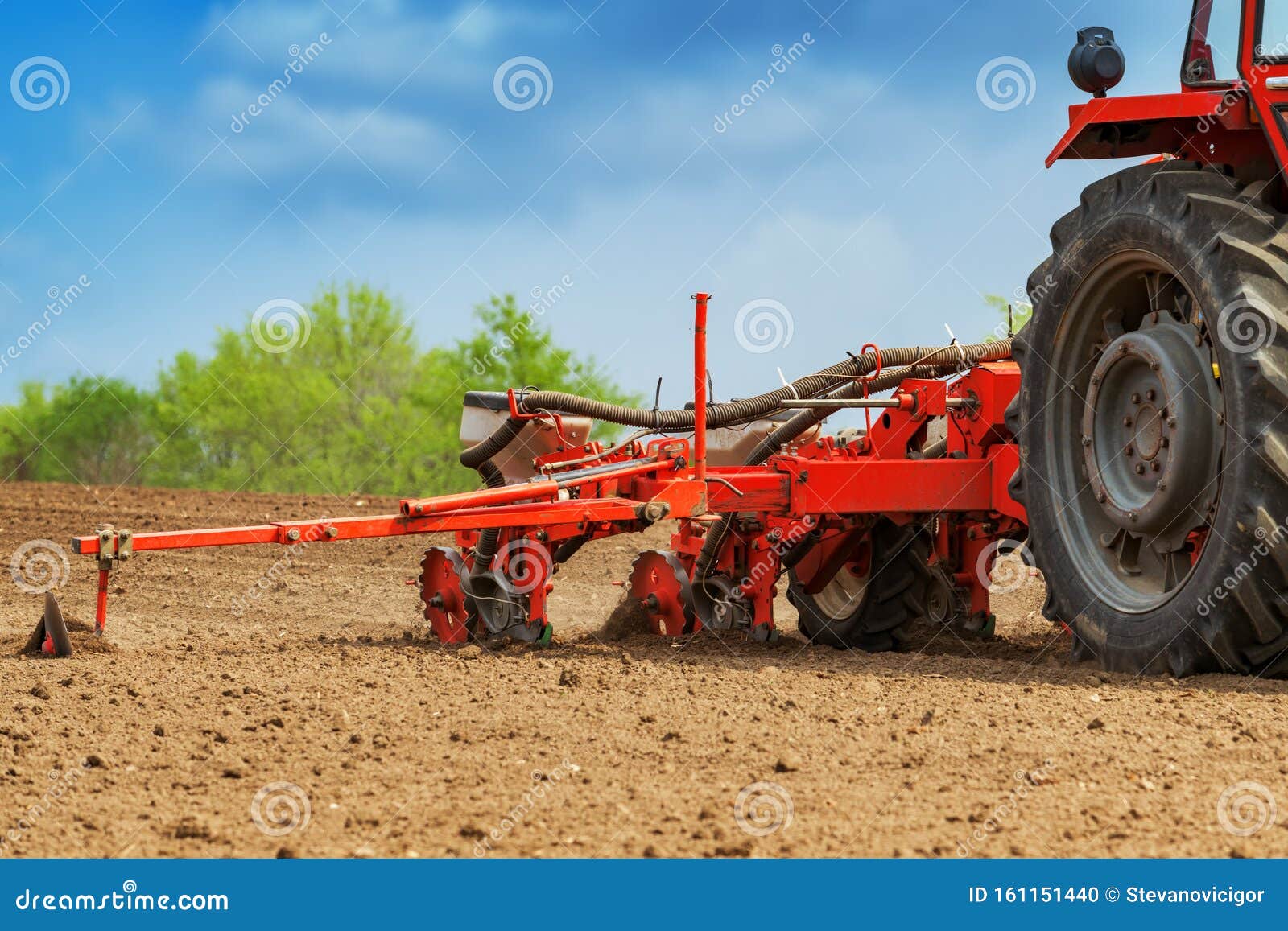 Tractor with Mounted Crop Seeder Stock Photo - Image of planting ...