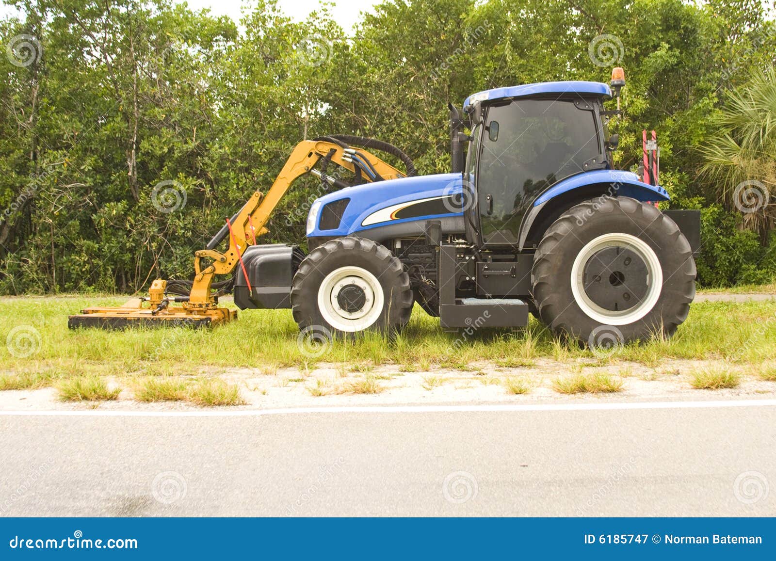 Tractor with Mower Arm Attached Stock Image - Image of tractor, cutting ...