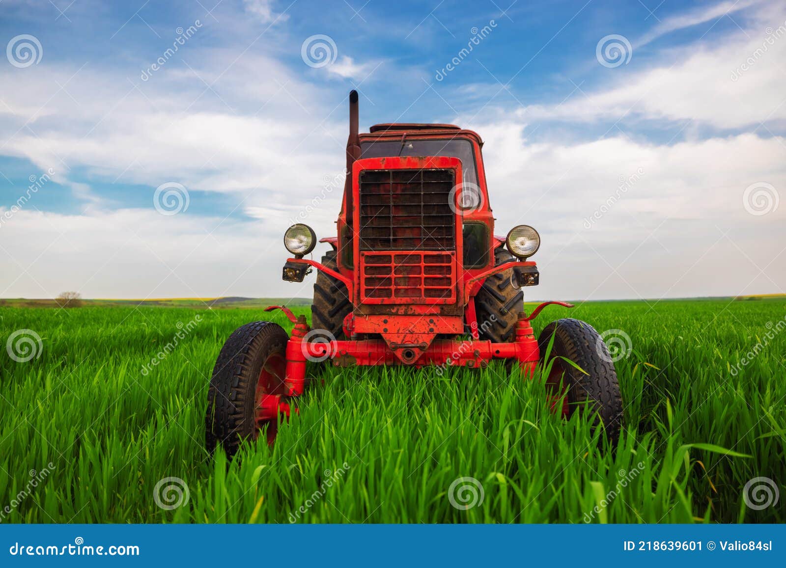 A Man On A Tractor Mowing Hay, Mower Lifted Into Transport Position ...