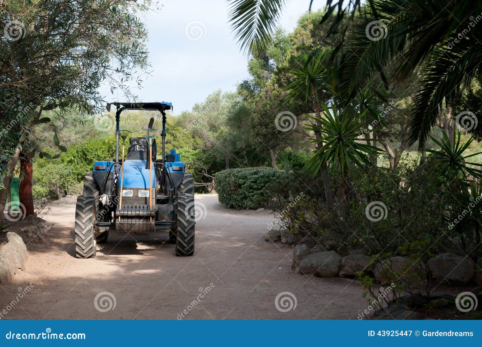 Tractor on a park lane stock image. Image of tools, pathway - 43925447