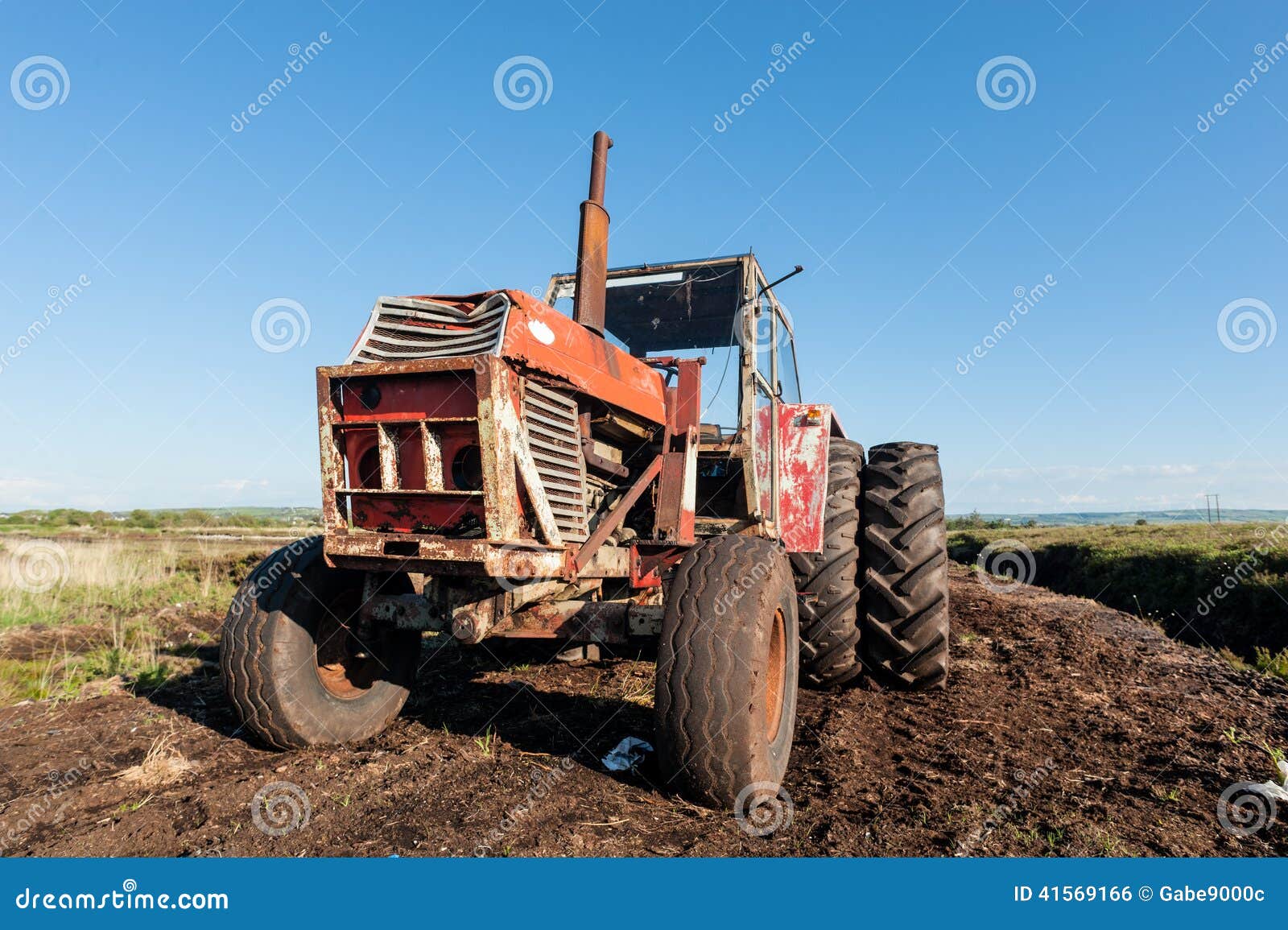 Tractor in a Peat Bog Field Stock Photo - Image of tractor, landscape ...