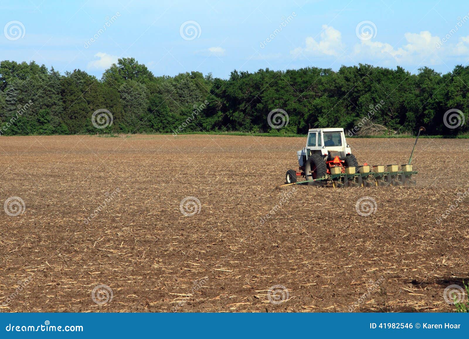 Tractor Planting the Field stock photo. Image of agriculture - 41982546