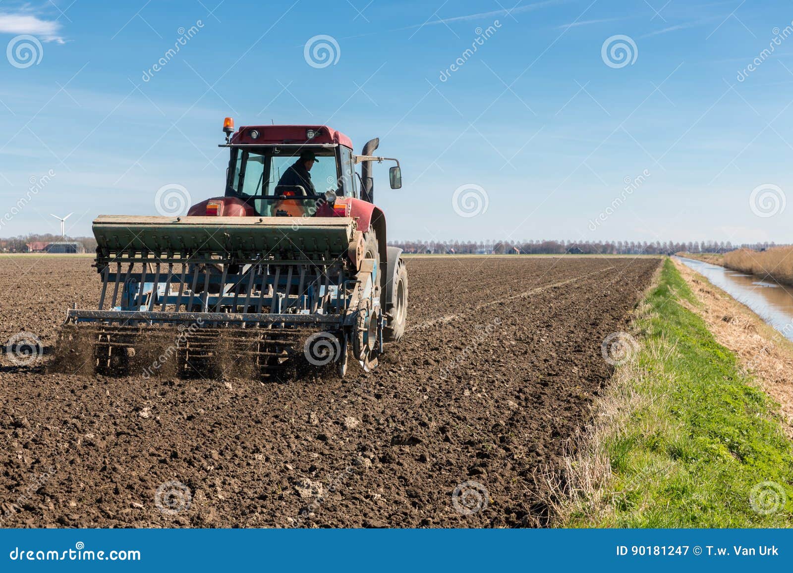 Tractor With Plough On Plowed. Ploughing And Soil Tillage. Agricultural ...