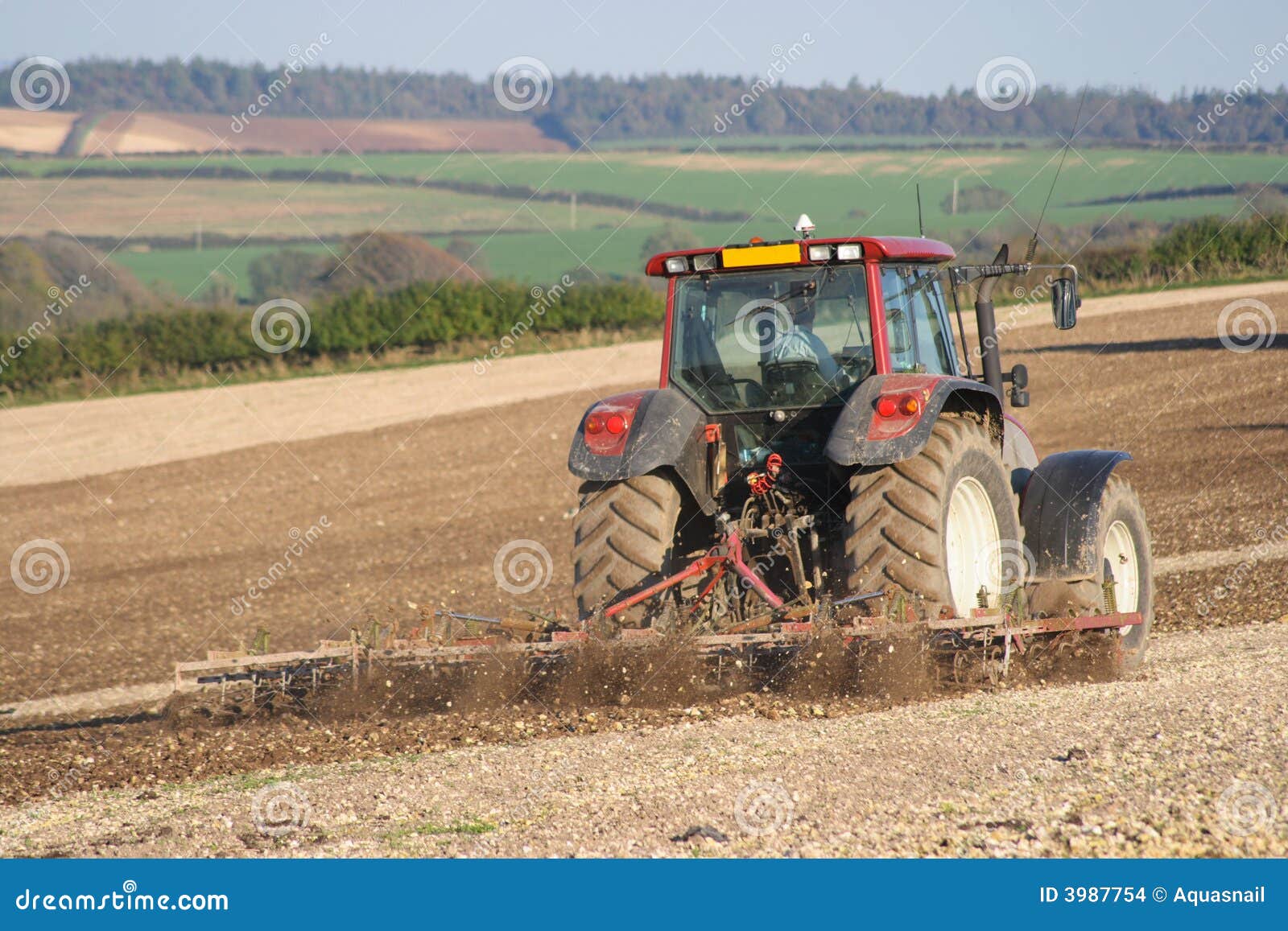 Tractor ploughing field stock photo. Image of vehicle - 3987754