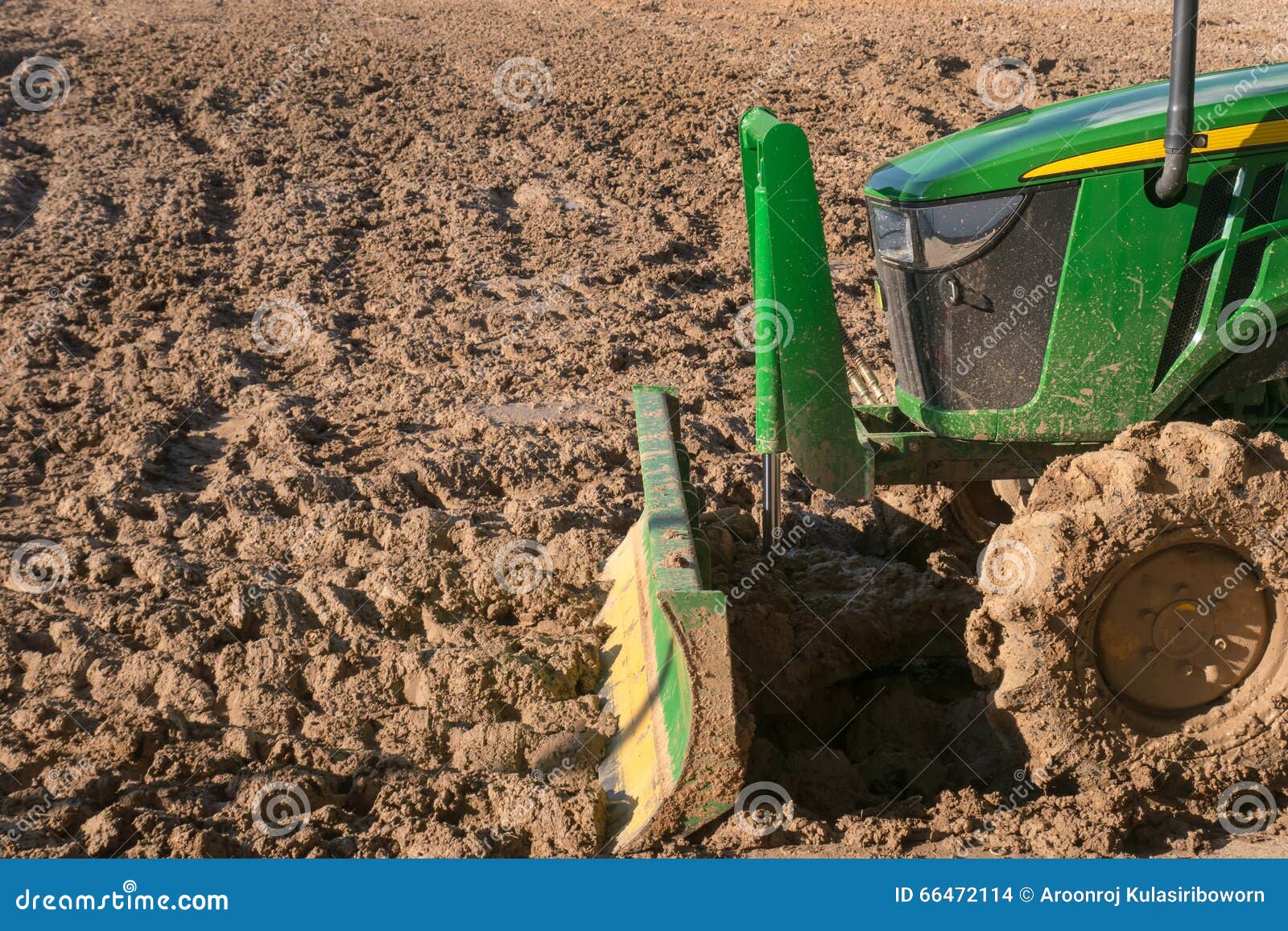 Tractor ploughing a field stock photo. Image of field - 66472114