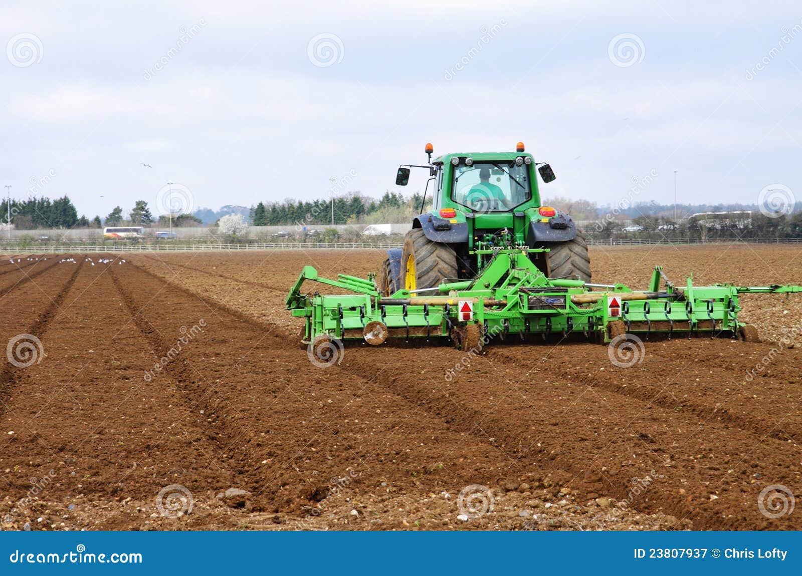 Tractor & Plow Tilling a Field Stock Image - Image of landscape, soil ...