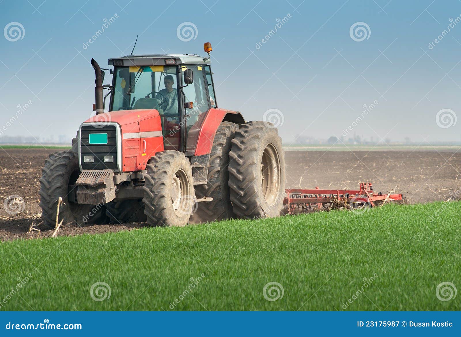 Tractor plowing stock image. Image of farmland, harrow - 23175987