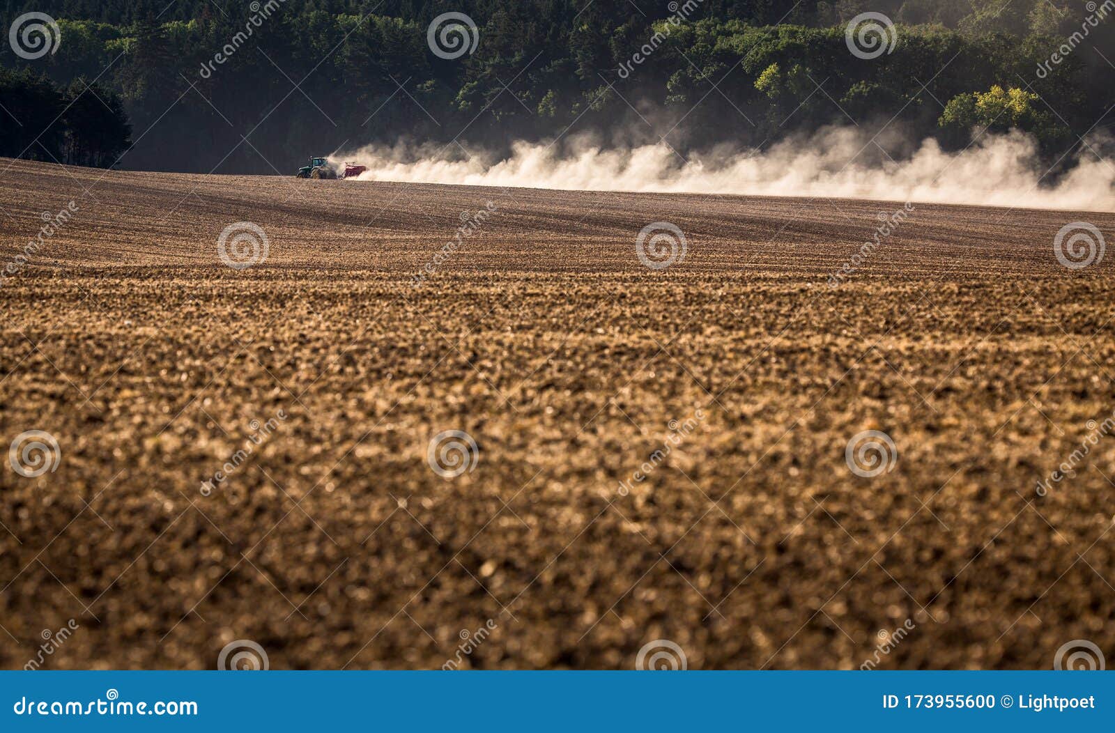 Tractor Plowing a Farm Field Stock Photo - Image of harrowing, desert ...