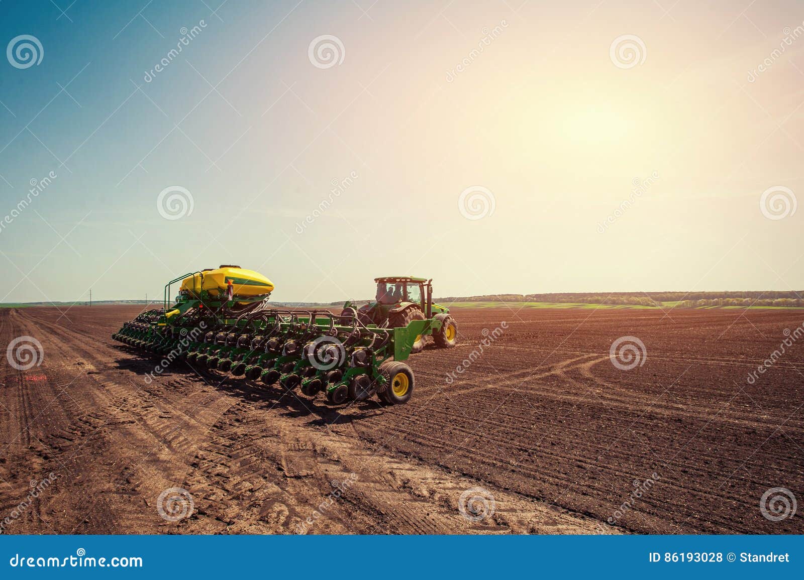 Tractor Plowing Farm Field in Preparation for Spring Planting Editorial ...