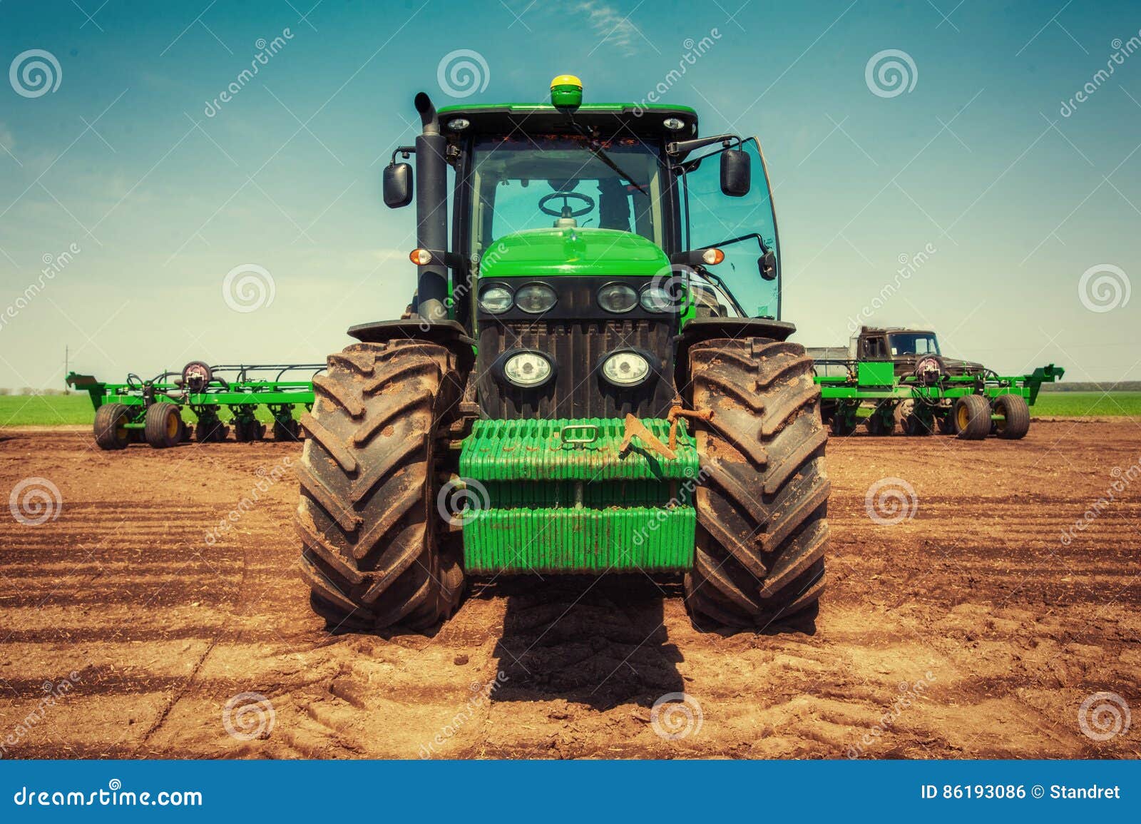 Tractor Plowing Farm Field in Preparation for Spring Planting Editorial ...