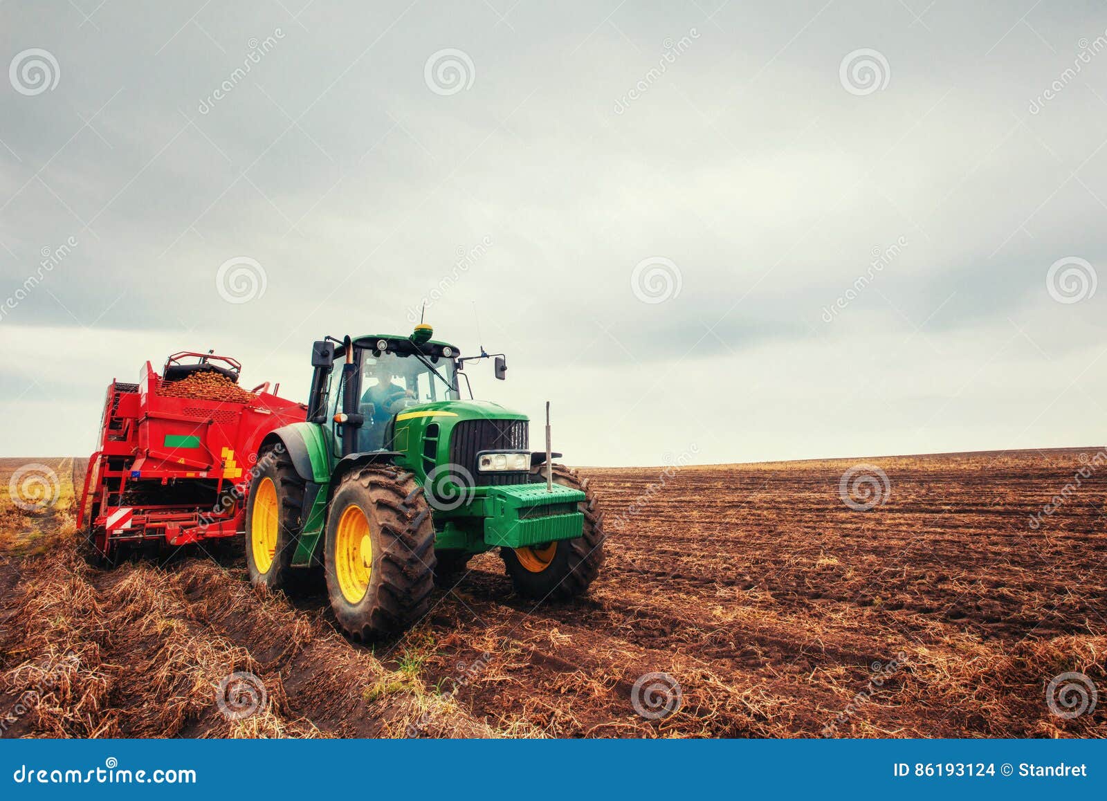 Tractor Plowing Farm Field in Preparation for Spring Planting Editorial ...