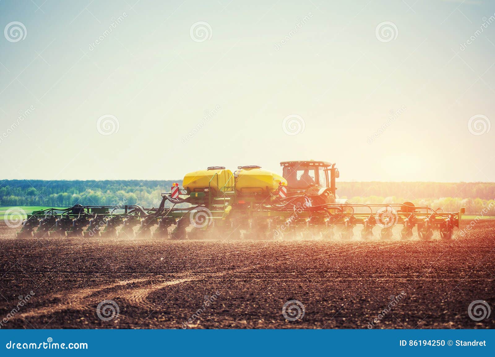 Tractor Plowing Farm Field in Preparation for Spring Planting Stock ...