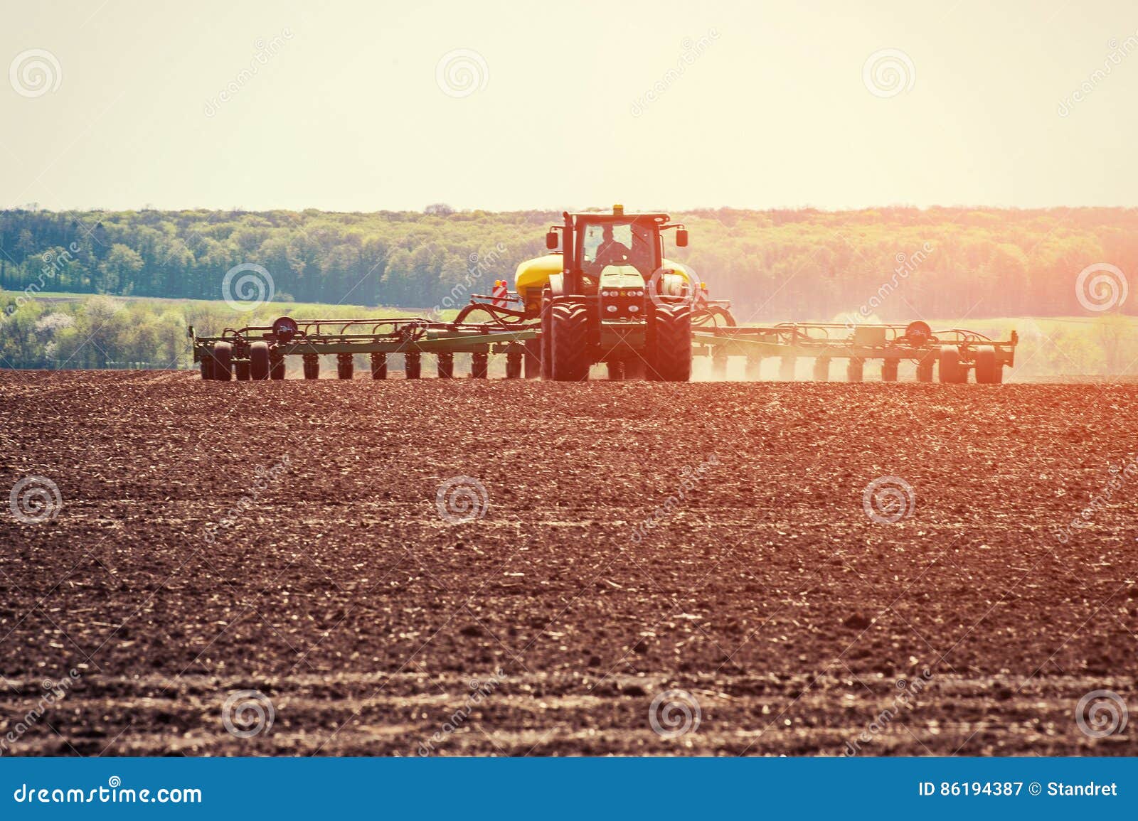 Tractor Plowing Farm Field in Preparation for Spring Planting Stock ...