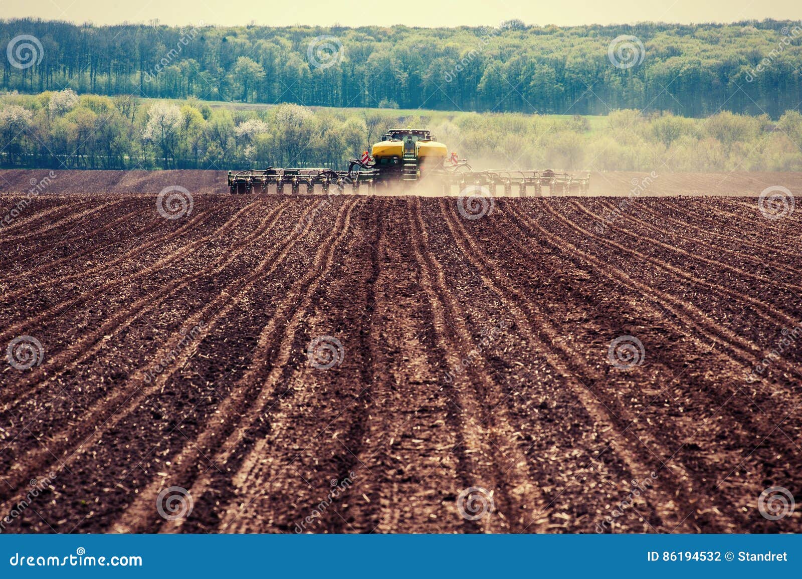Tractor Plowing Farm Field in Preparation for Spring Planting Stock ...