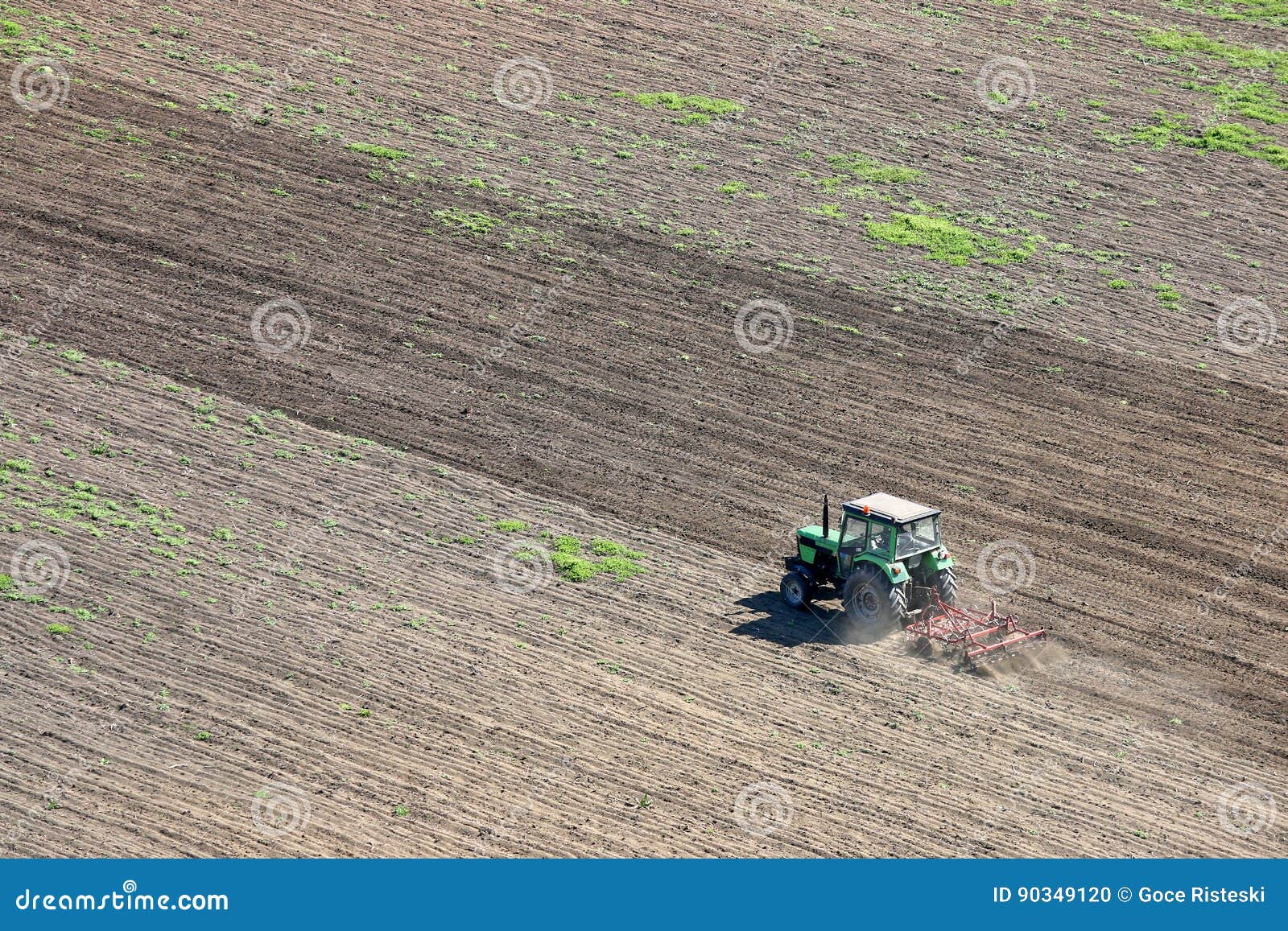 Tractor plowing a field stock photo. Image of nature - 90349120