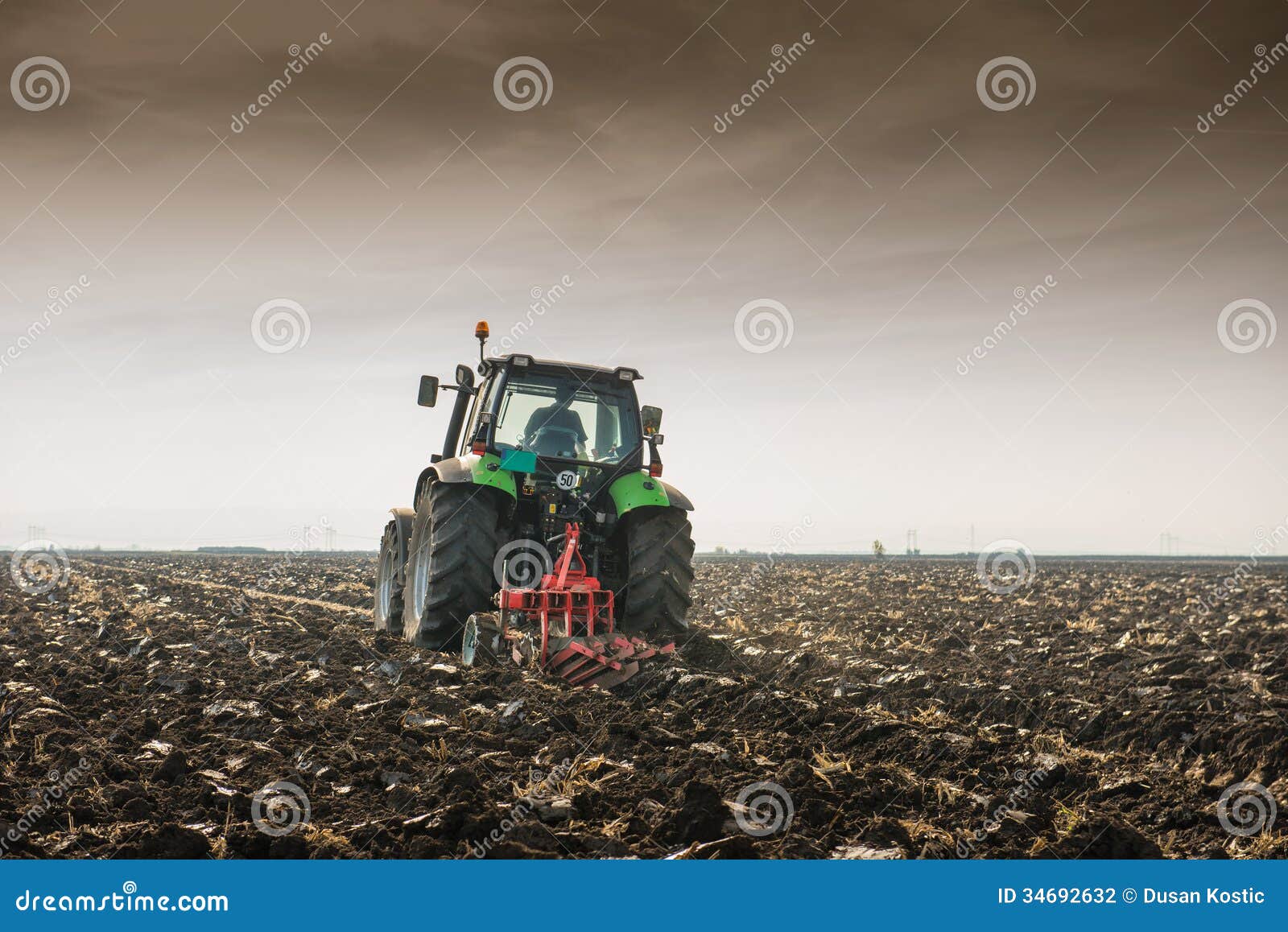 Tractor plowing field stock photo. Image of rural, tractor - 34692632