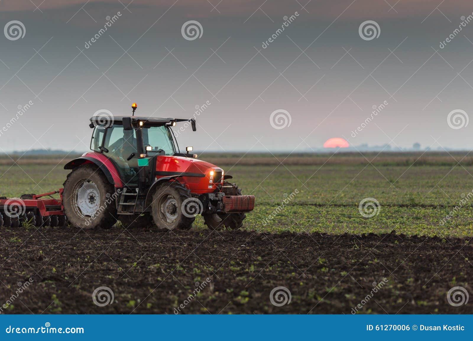 Tractor plowing a field stock photo. Image of land, life - 61270006