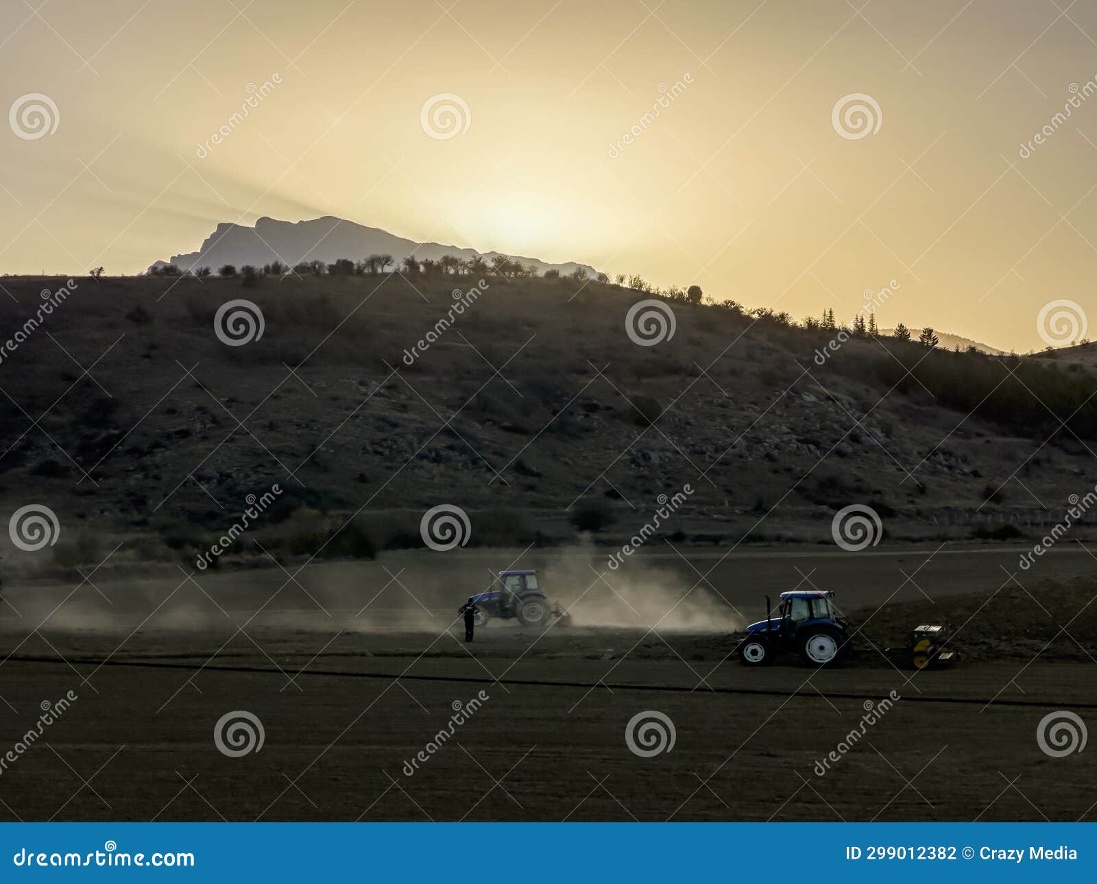 Tractor Plowing in the Field and People Working Stock Photo - Image of ...