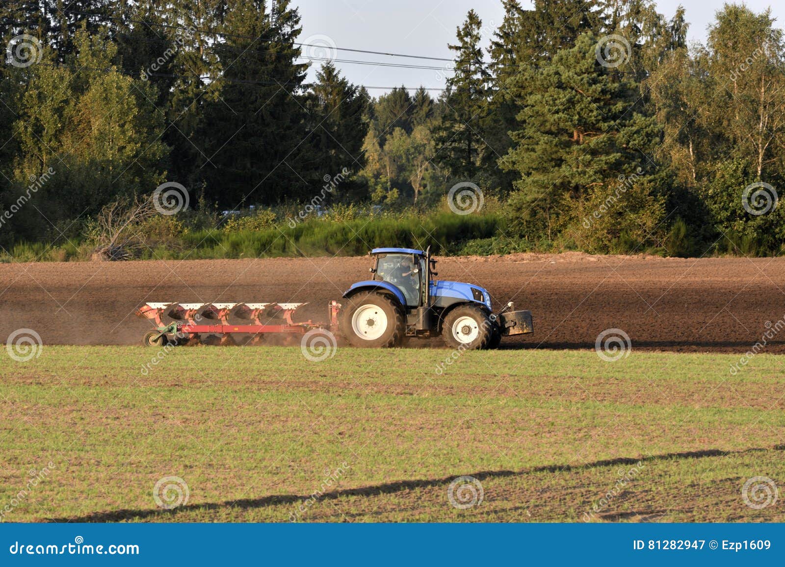 Tractor plowing field stock image. Image of cultivation - 81282947