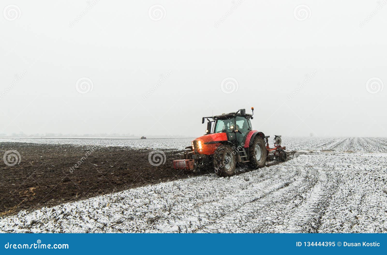 Tractor plowing a field stock image. Image of agricultural - 134444395