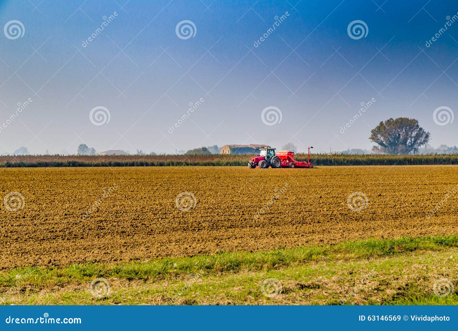 Tractor plowing a field stock image. Image of cultivated - 63146569