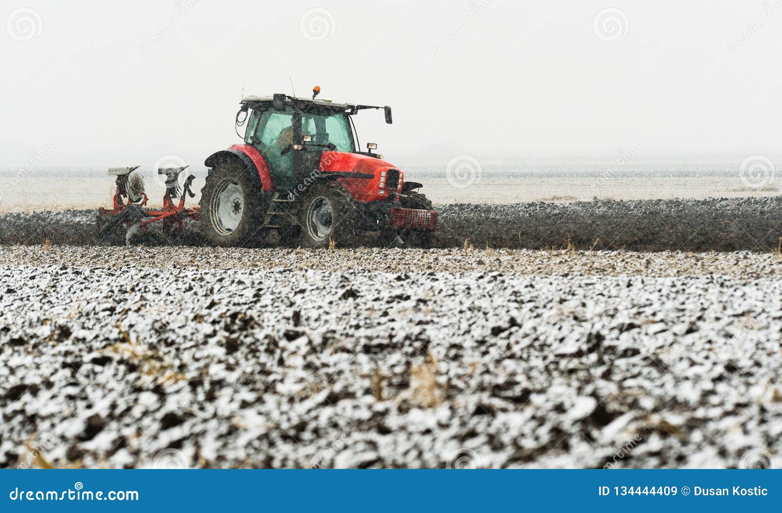 Tractor plowing a field stock image. Image of agriculture - 134444409
