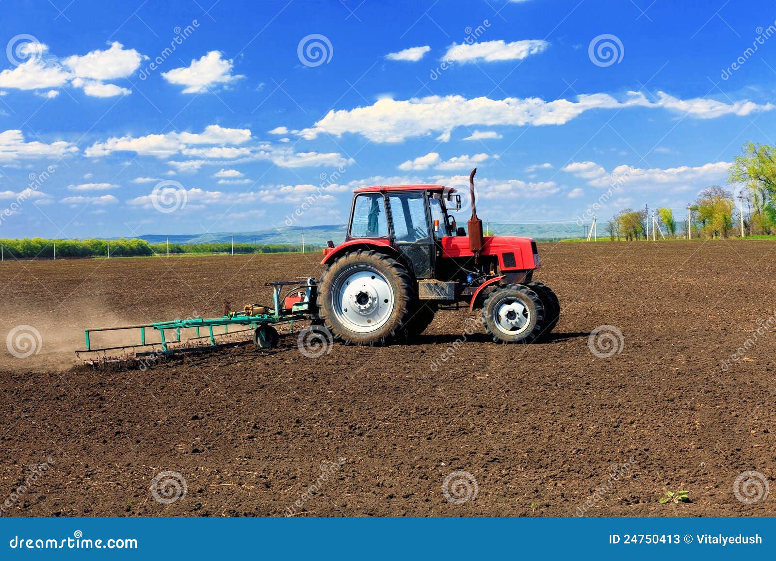 Tractor Plowing the Fields in Early Spring. Stock Image - Image of ...