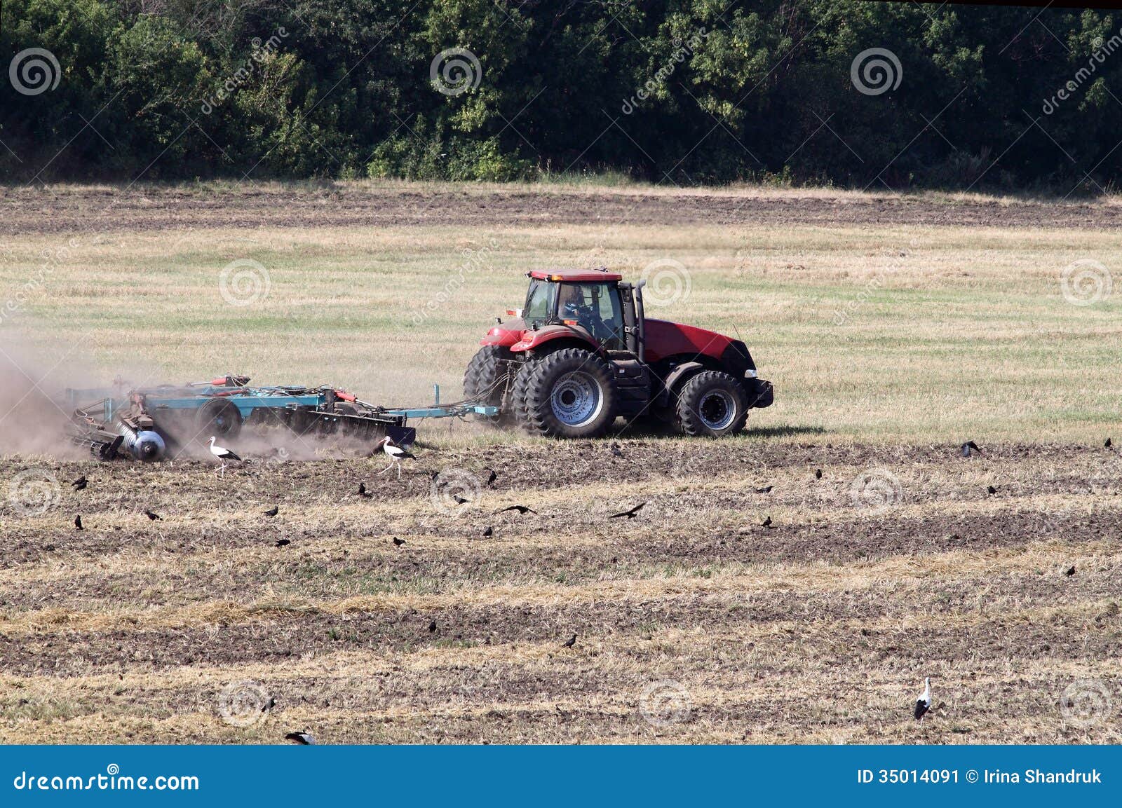Tractor plows land stock image. Image of agriculture - 35014091