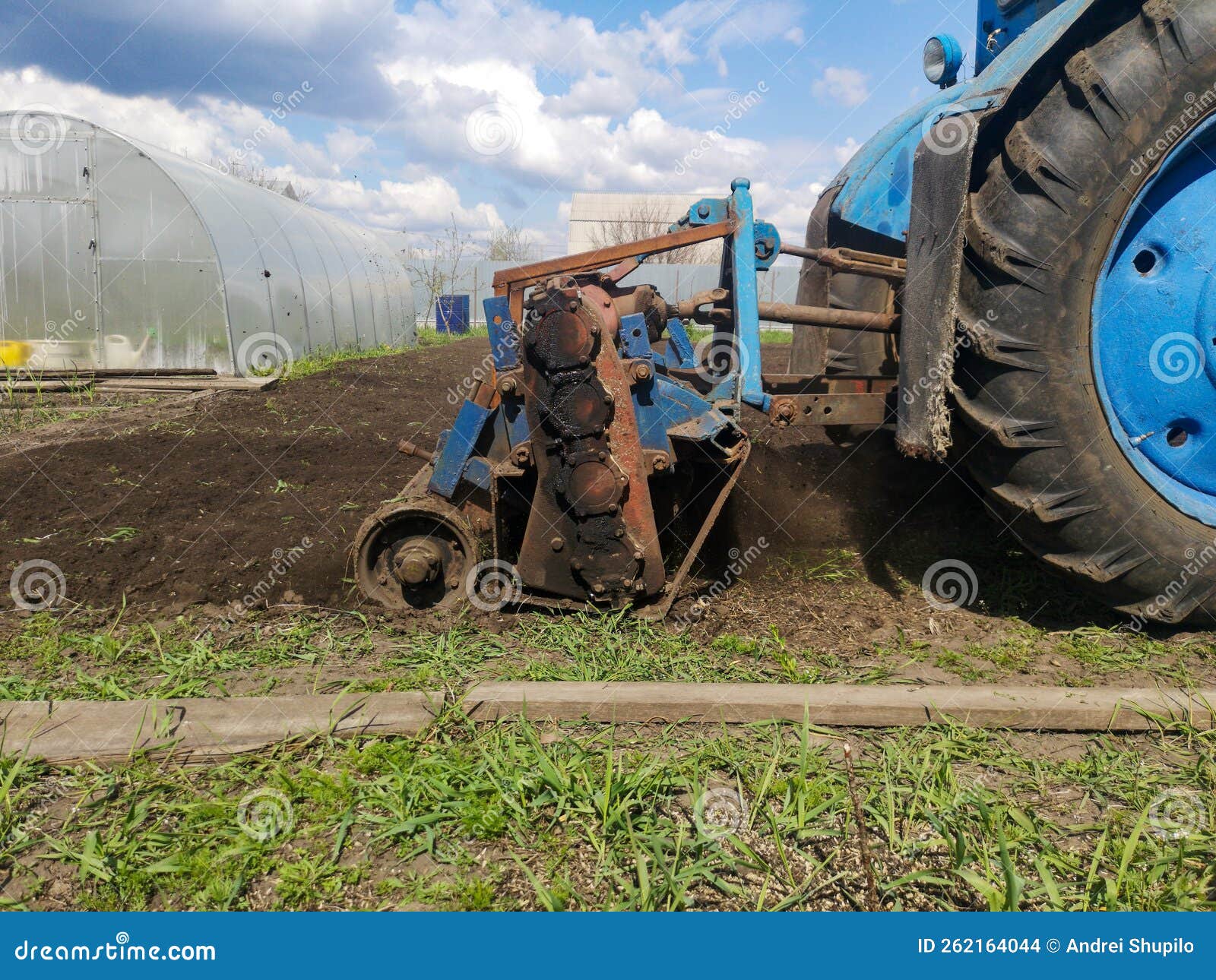 The Tractor Plows the Soil on the Field Stock Photo - Image of farming ...