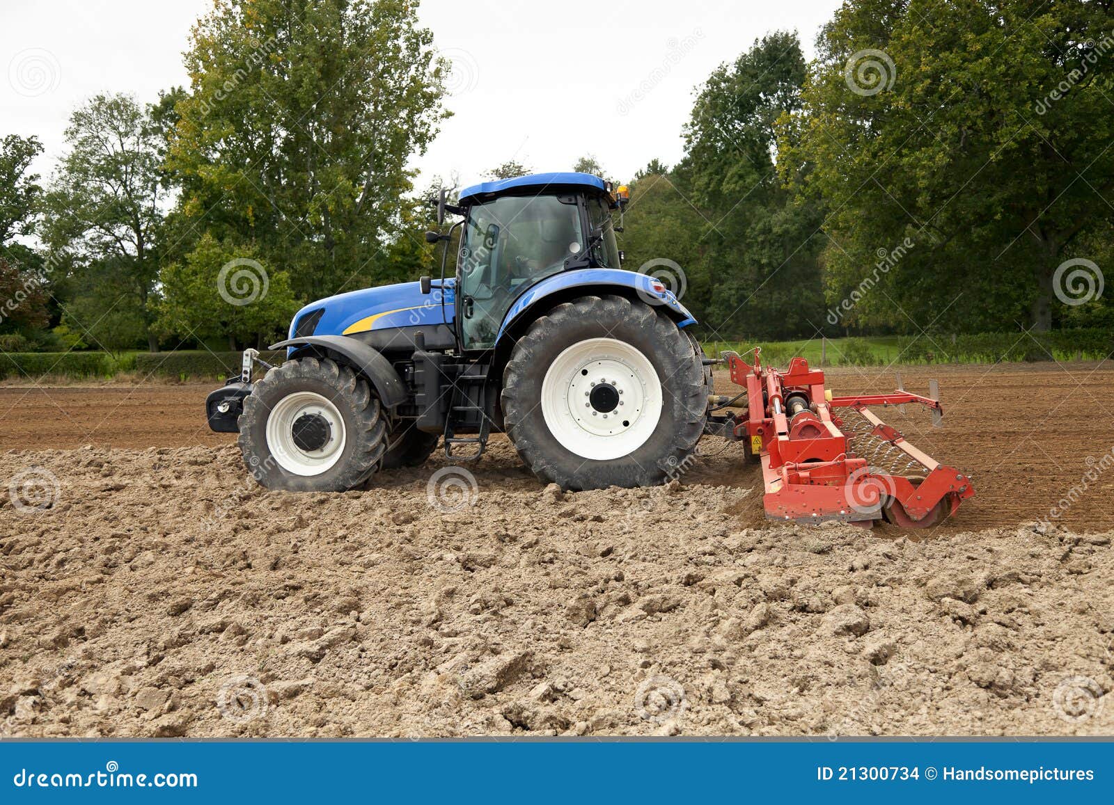 Tractor with Power Harrow Side View Stock Photo - Image of farming ...