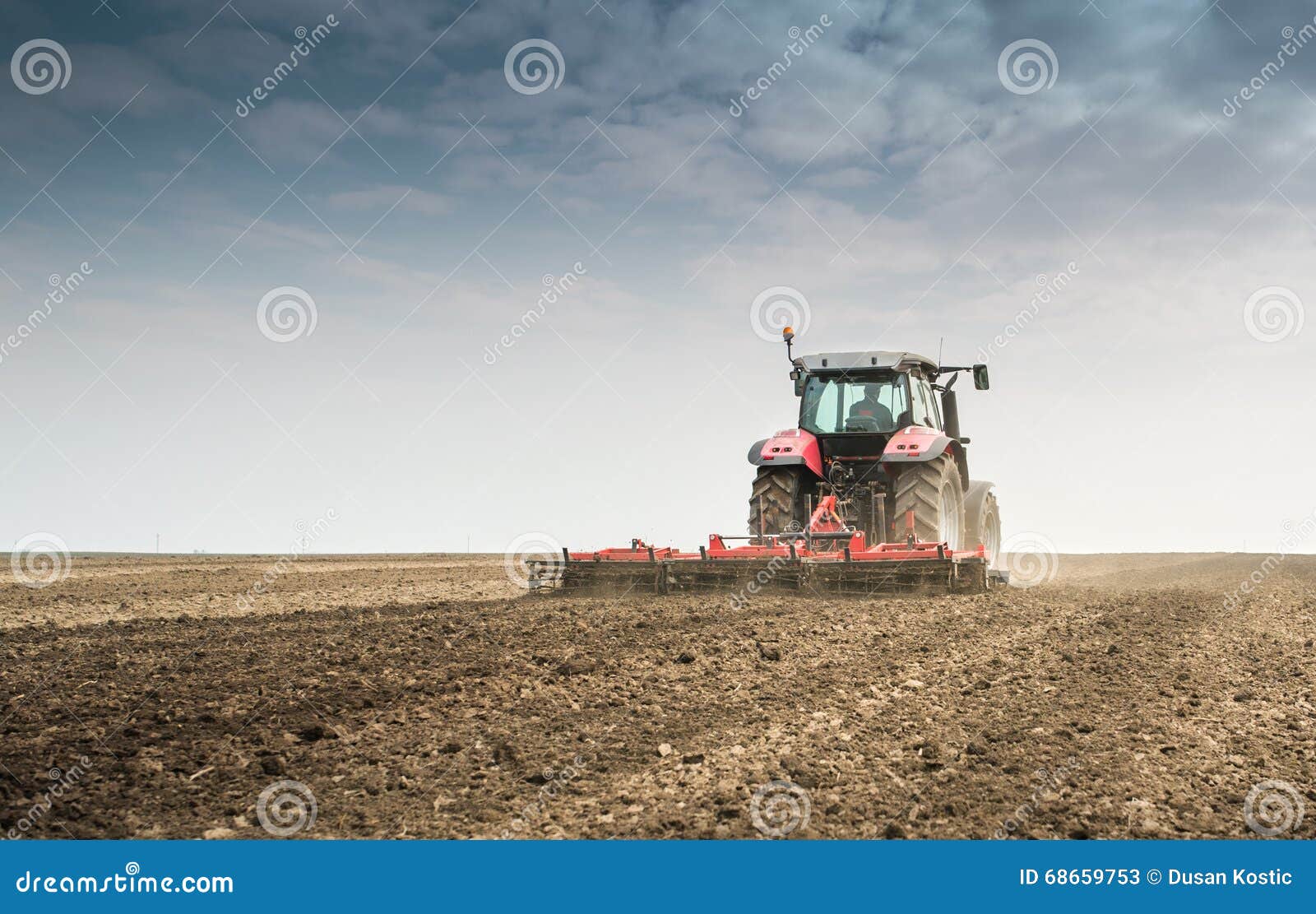 Tractor preparing land stock image. Image of autumn, equipment - 68659753