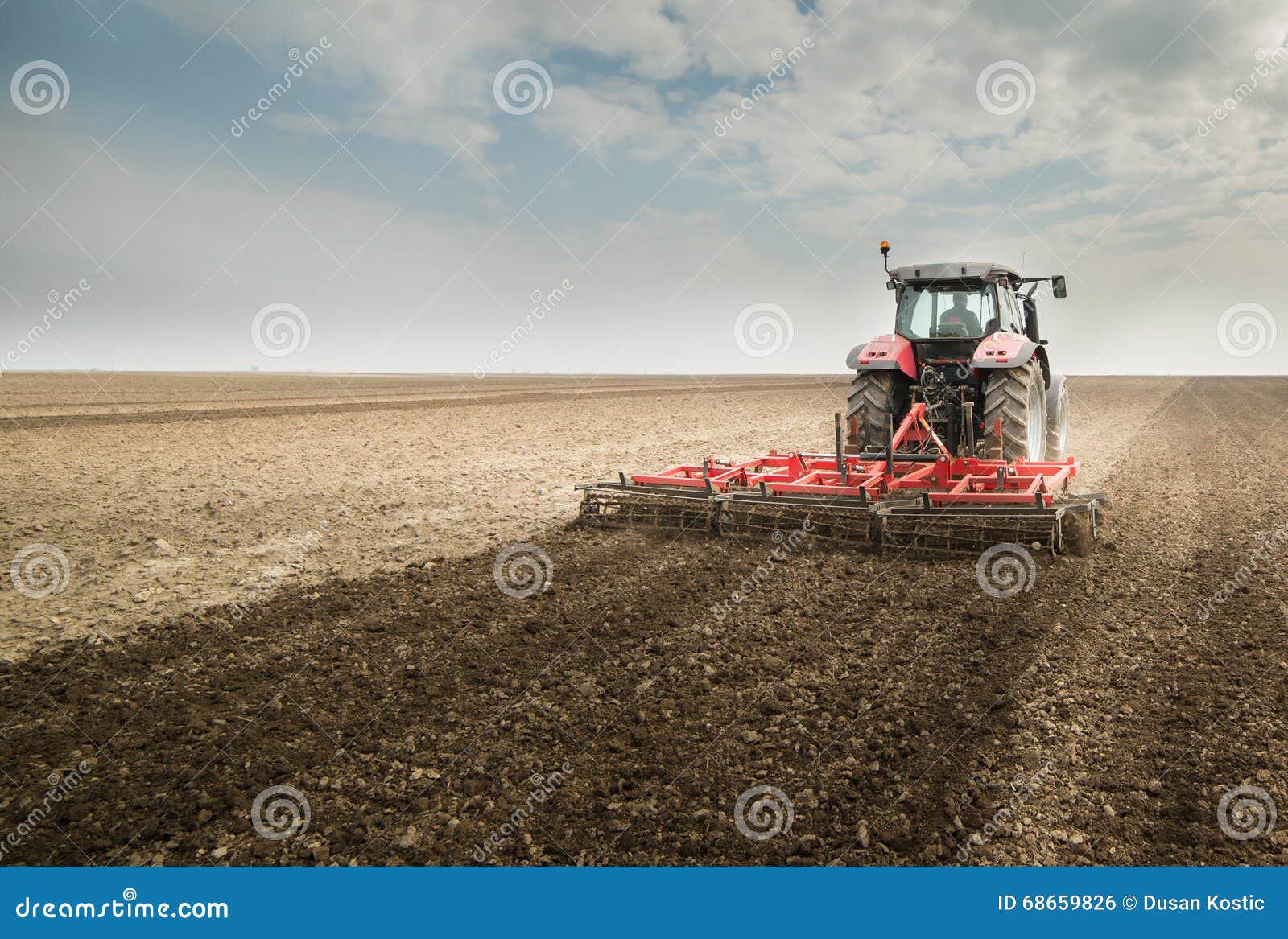 Tractor preparing land stock photo. Image of autumn, preparation - 68659826