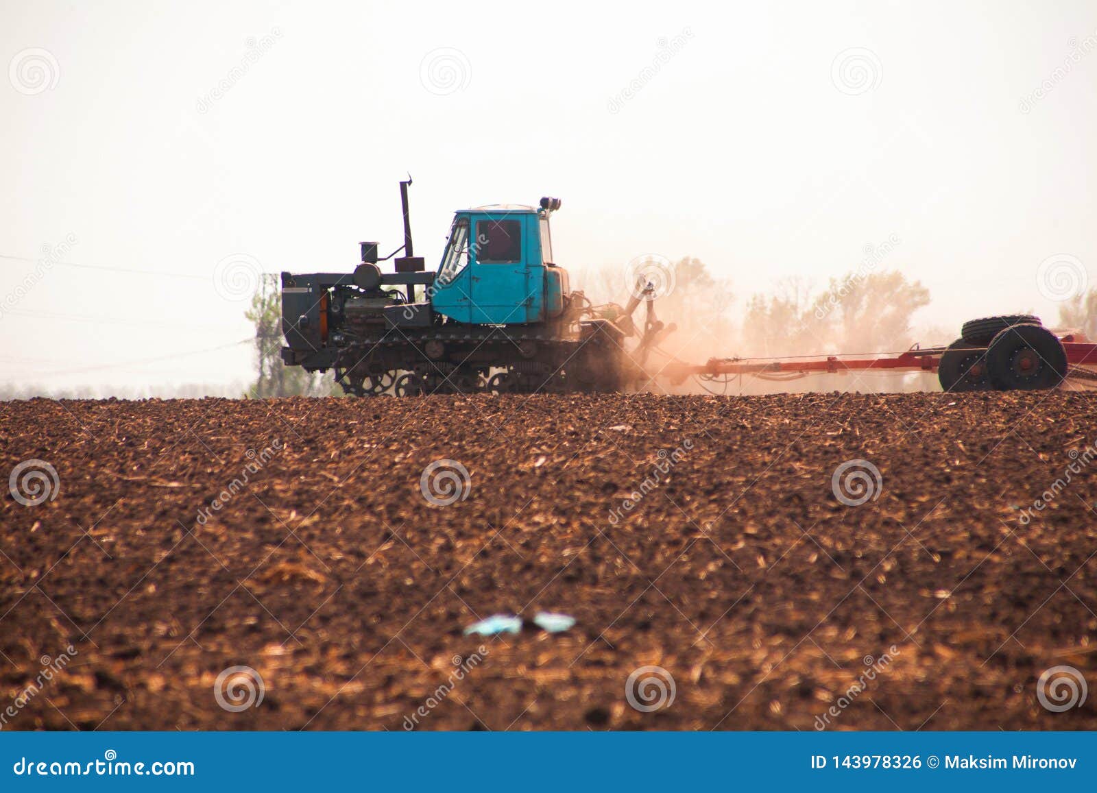 Tractor Preparing Land for Sowing Stock Photo - Image of landscaped ...