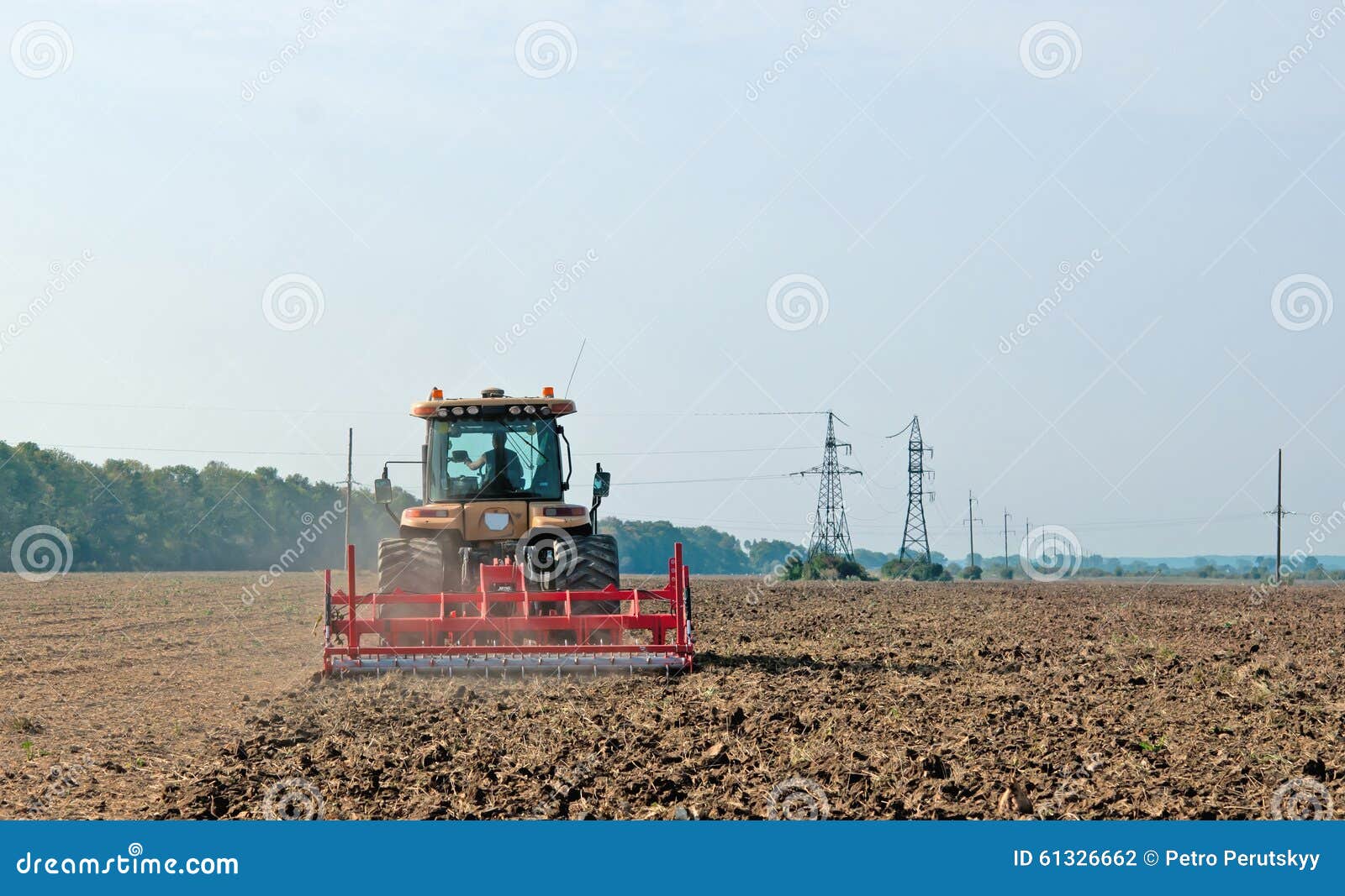 Tractor processes field stock photo. Image of transportation - 61326662