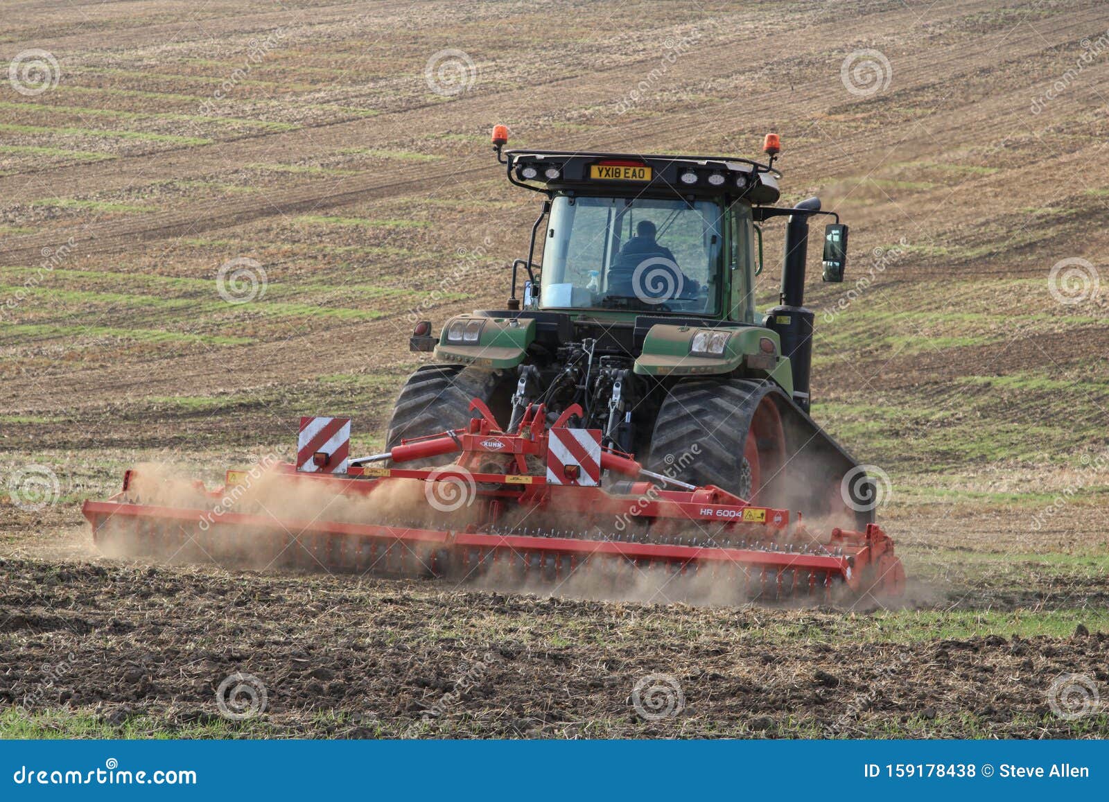 Tractor Pulling a Ridged Roller - Yorkshire - England Editorial Stock ...