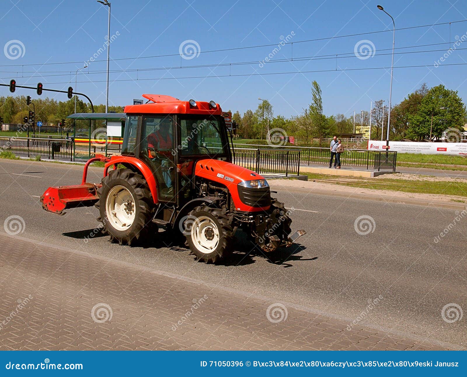 Tractor on the road. editorial photo. Image of city, reportage - 71050396
